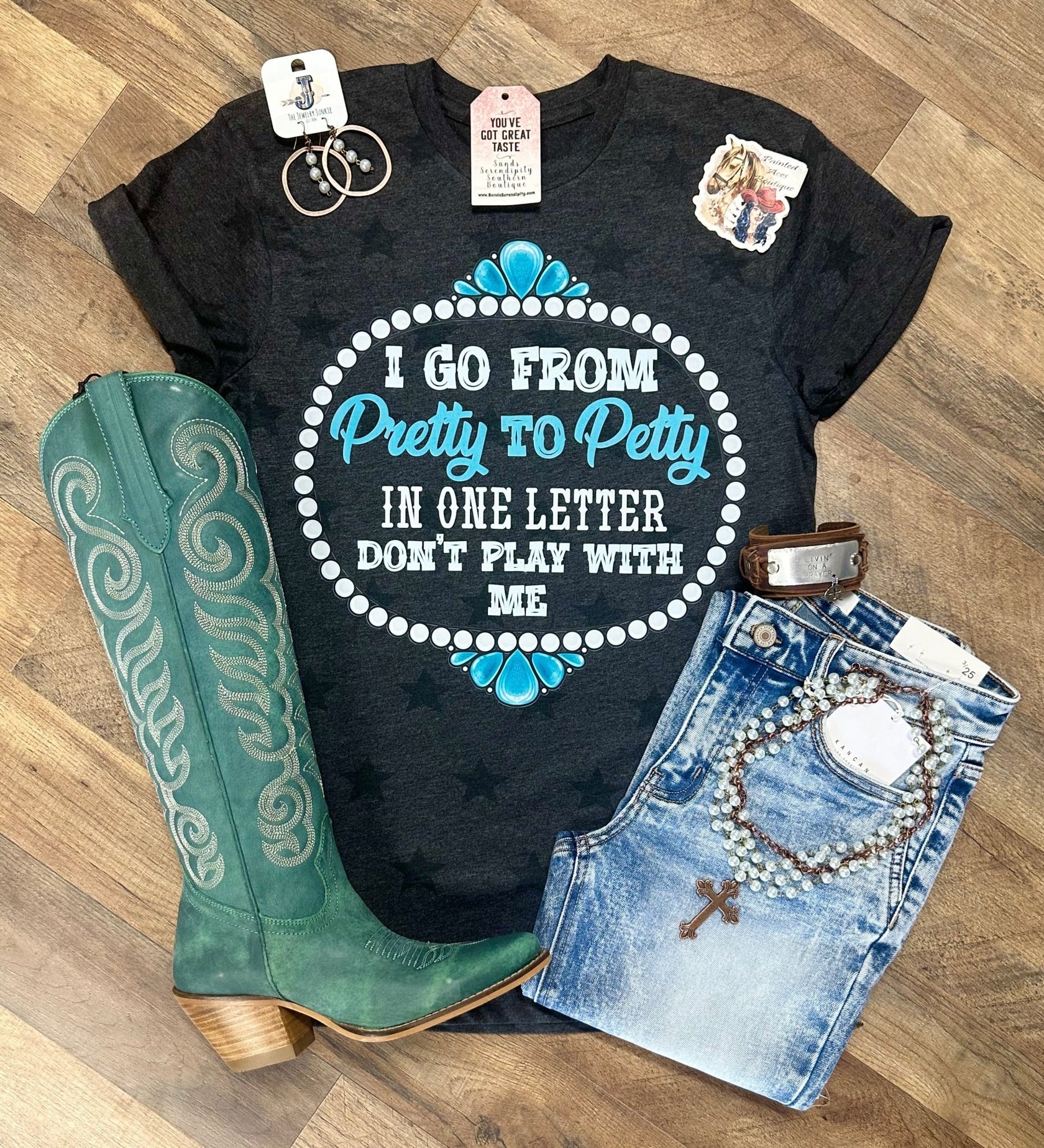 Pretty To Petty In 1 Letter | Funny Country Graphic T-Shirt – Painted ...